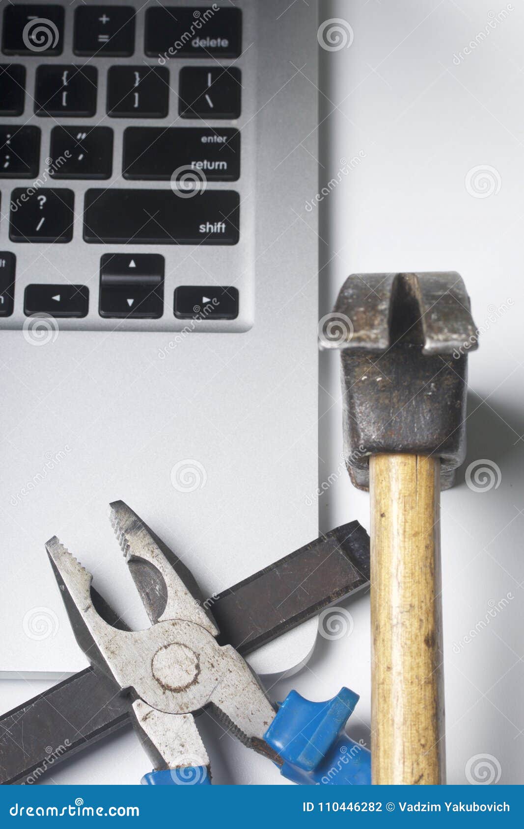 Laptop and Work Tools. on the White Surface of the Table is a Tablet ...