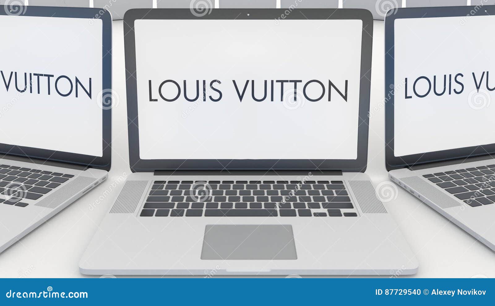Laptop With Louis Vuitton Logo On The Screen. Modern Workplace ...