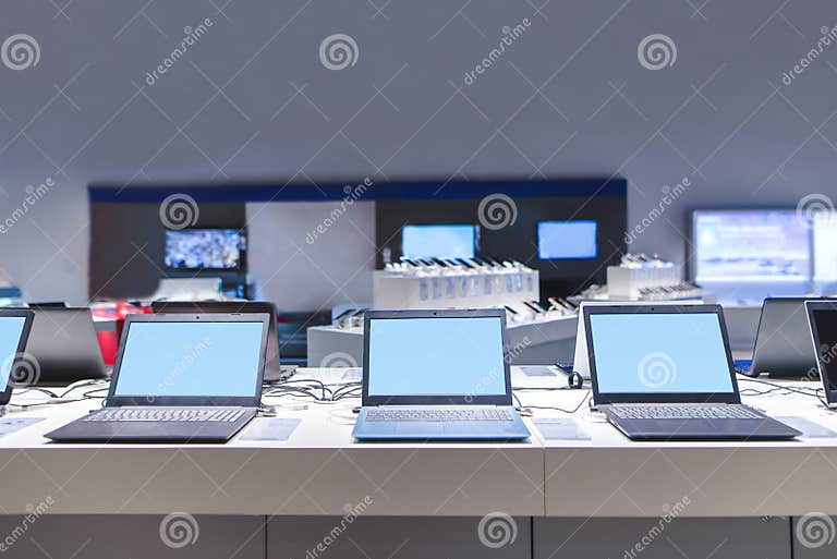 Laptops in the Modern Electronics Store. Computer Department in the ...
