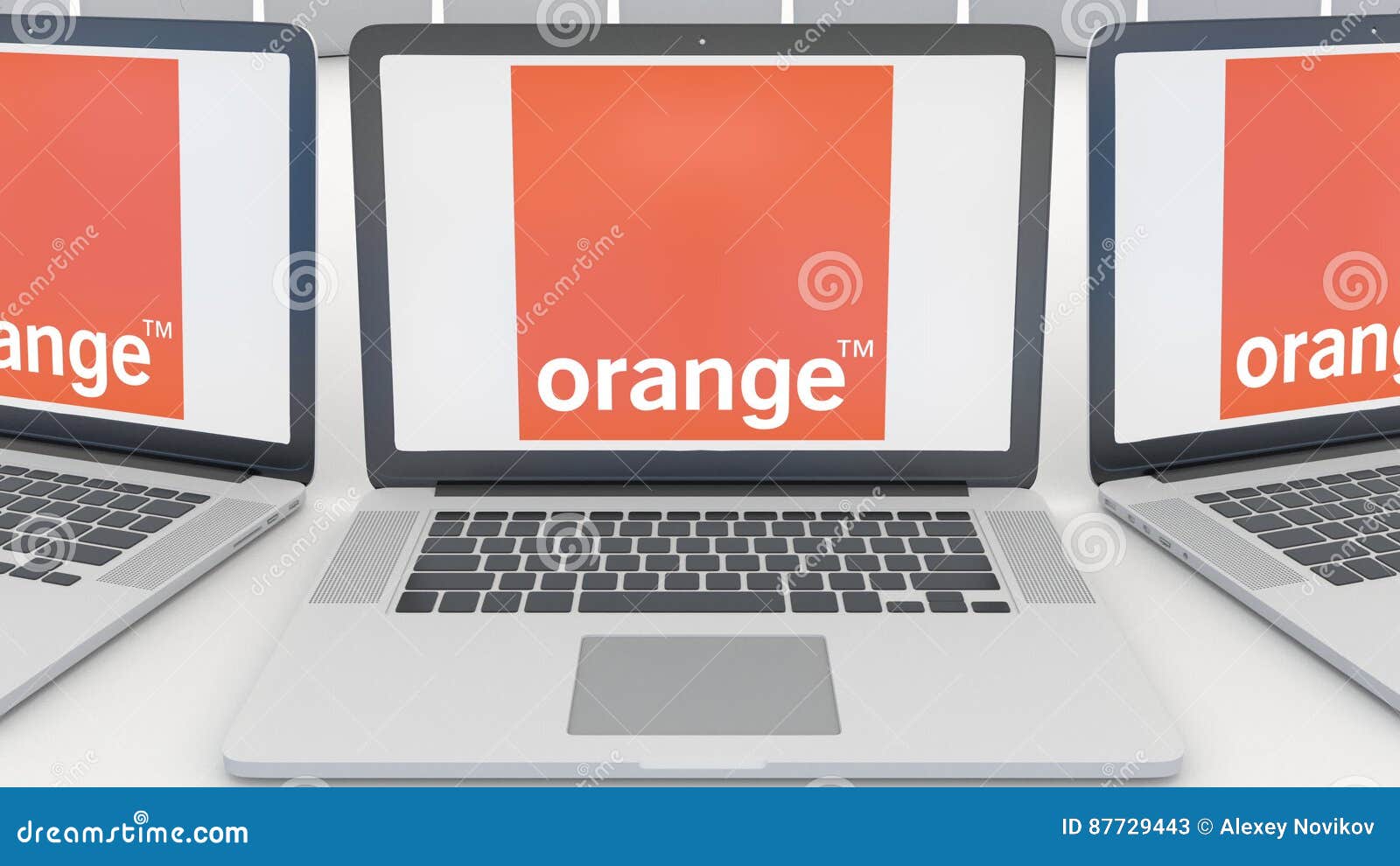 Laptops with Orange S.a. Logo on the Screen. Computer Technology ...