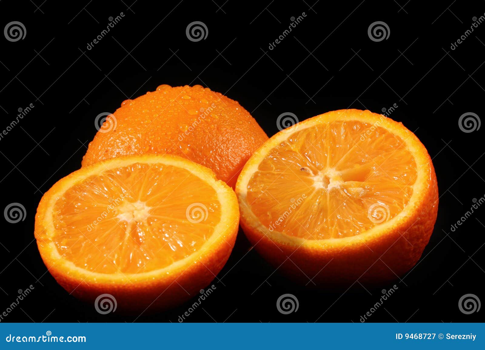 Laranja cortada no preto imagem de stock. Imagem de ingrediente - 9468727