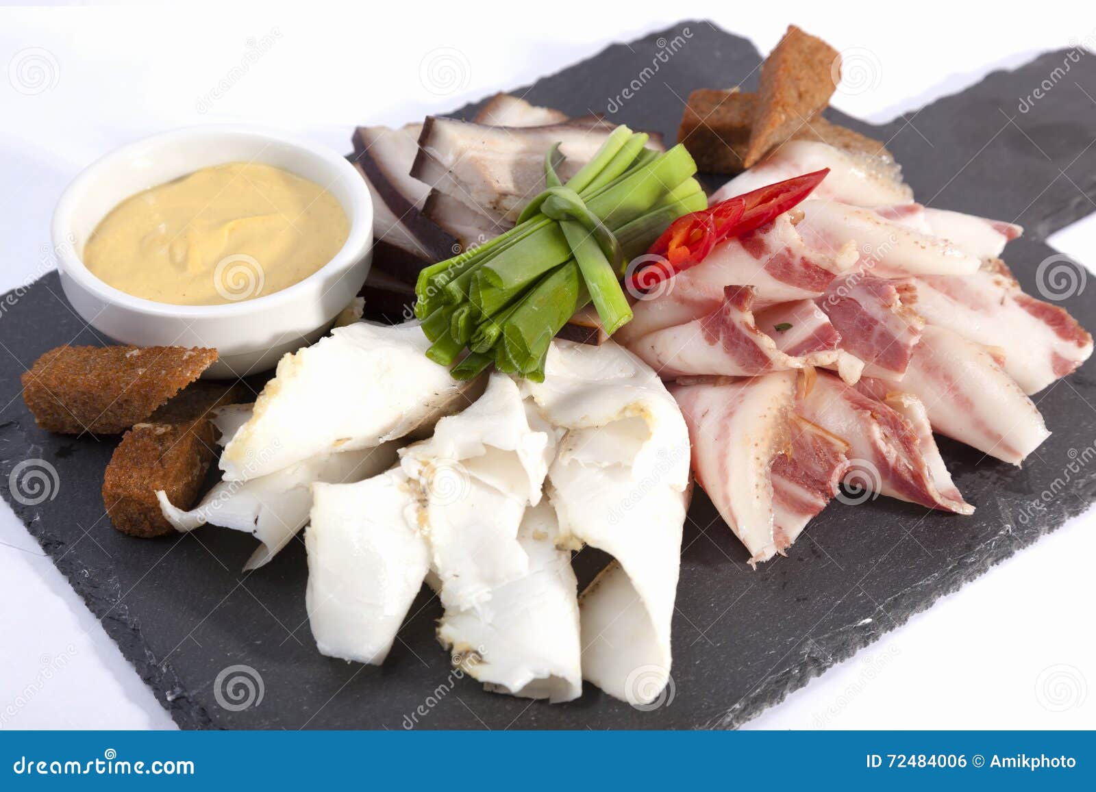 Lard and Bacon on a Black Plate Stock Photo - Image of delicious, bowl ...