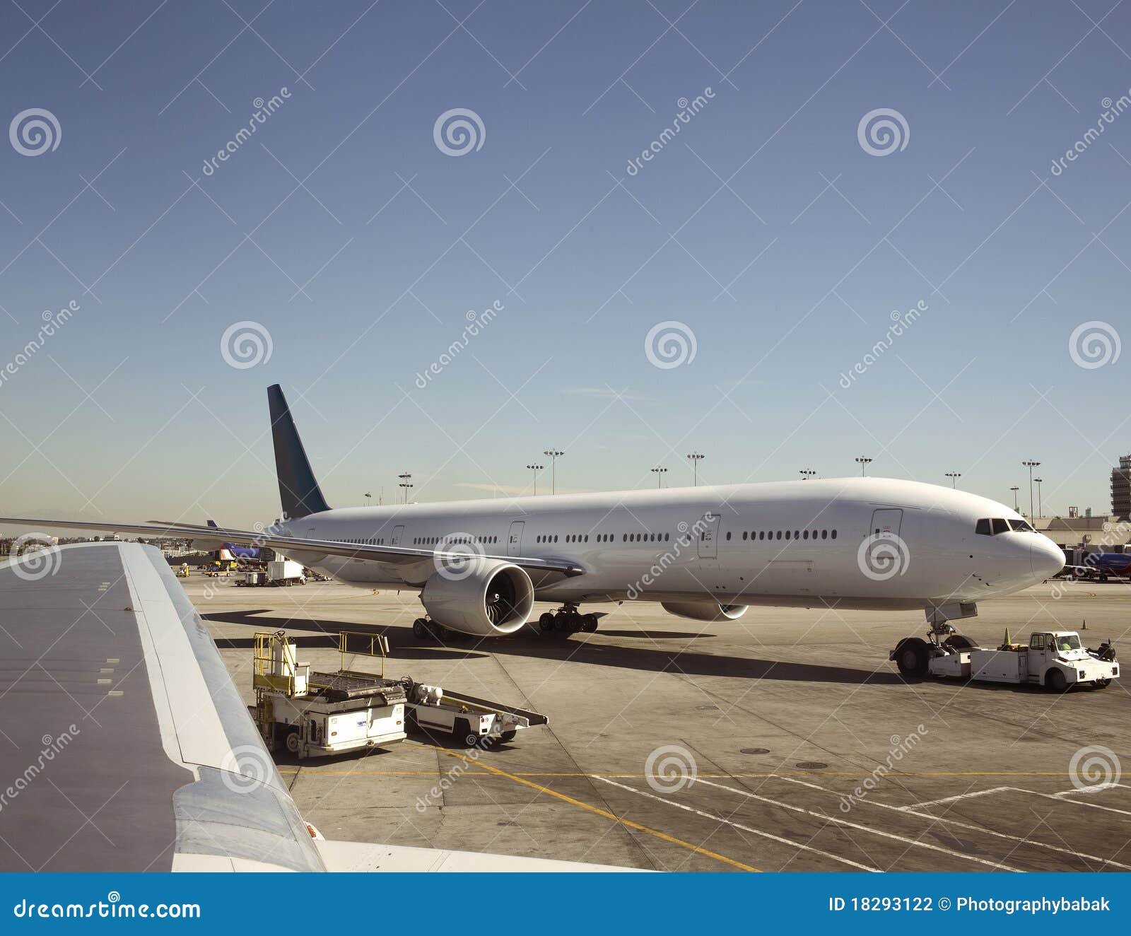 Large Airplane Being Pulled Stock Photo - Image of pulled, equipment ...