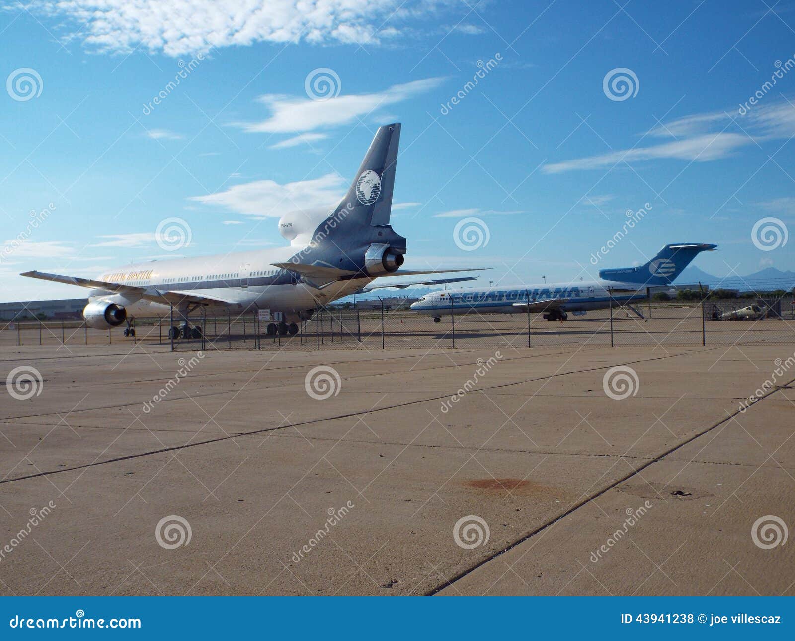 Large Airplane Flying At Cruise Altitude With Contrails. Photo From The ...