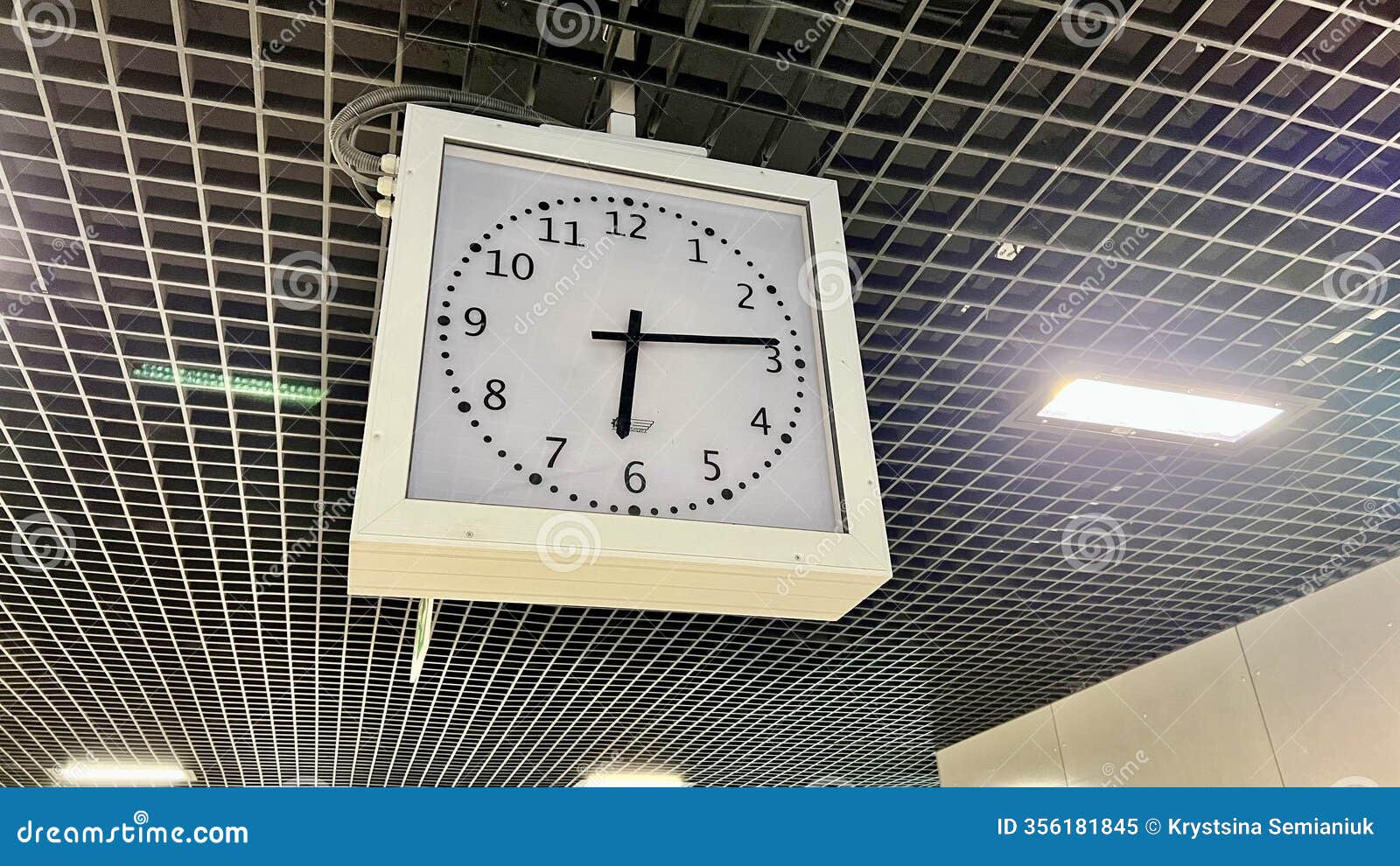Clock Is Hanging On The Steel Arch Roof Structure At Train Station ...