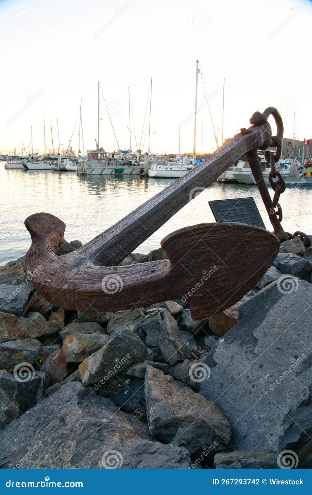 Large Anchor Statue at a Port Stock Photo - Image of sailing, water ...
