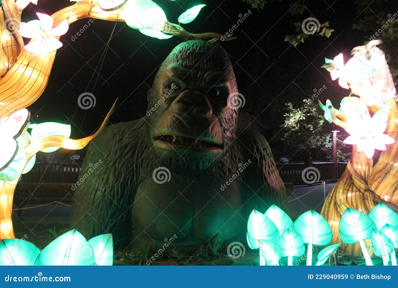 A Large Animatronic Ape with an Angry Expression and Lantern Trees ...