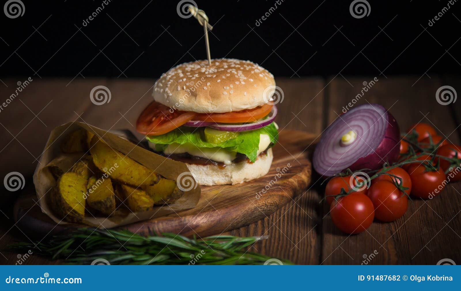 Large Appetizing Burger with Beef, Potatoes and Cheese on a Wooden ...