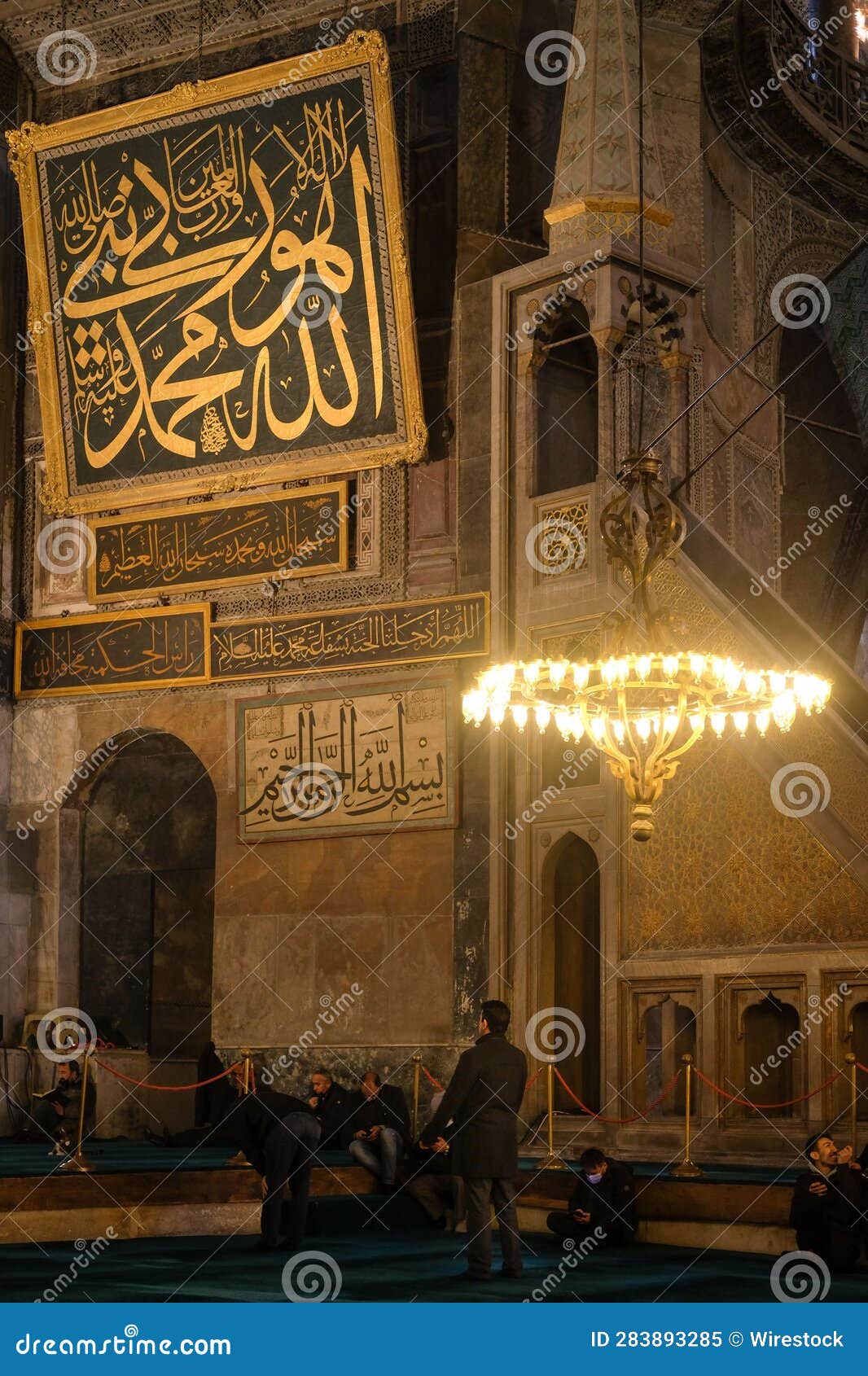 Large Arabic Banner Hanging on the Wall of an Oriental Building ...