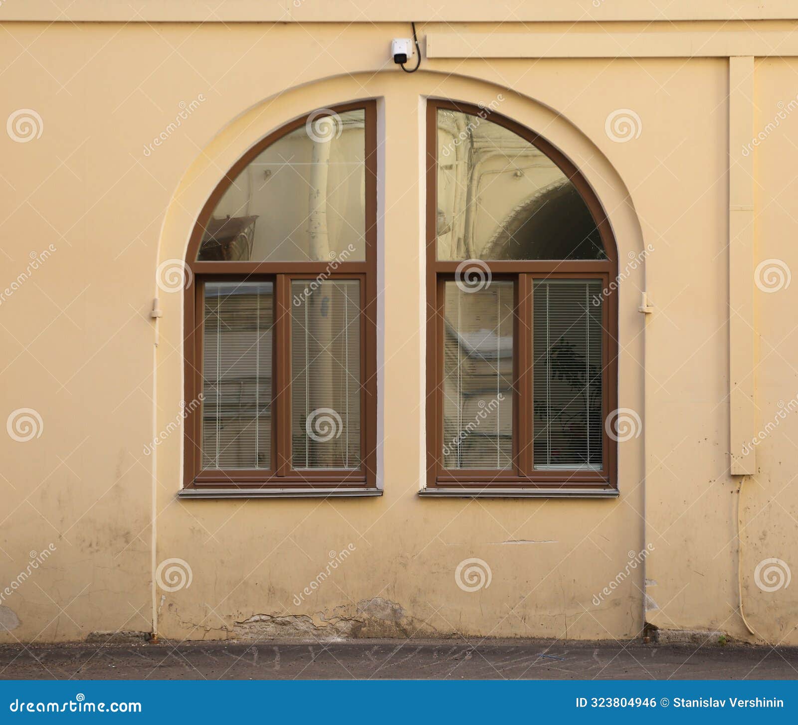 Large Arched Window Divided into Two Stock Photo - Image of large, city ...