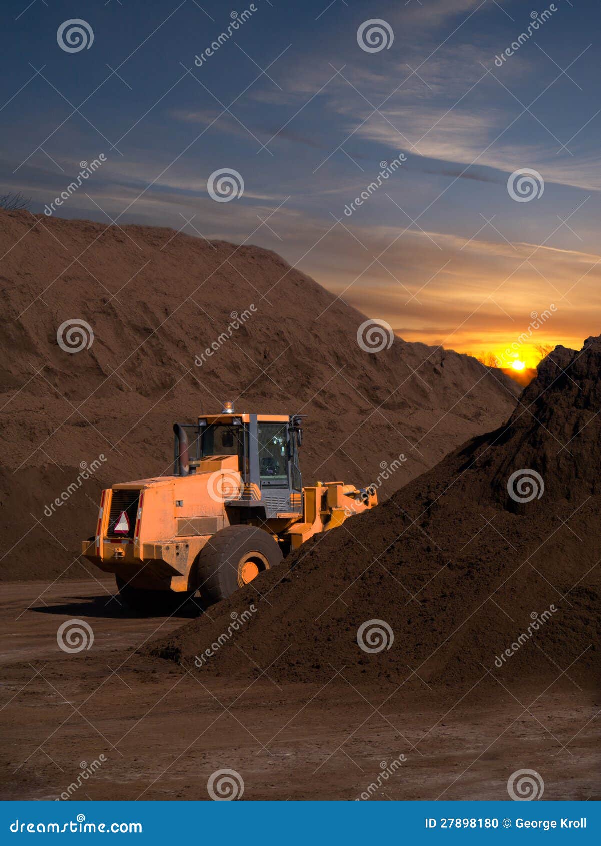 Large Backhoe and Top Soil Piles at Sunset Sunrise Stock Photo - Image ...