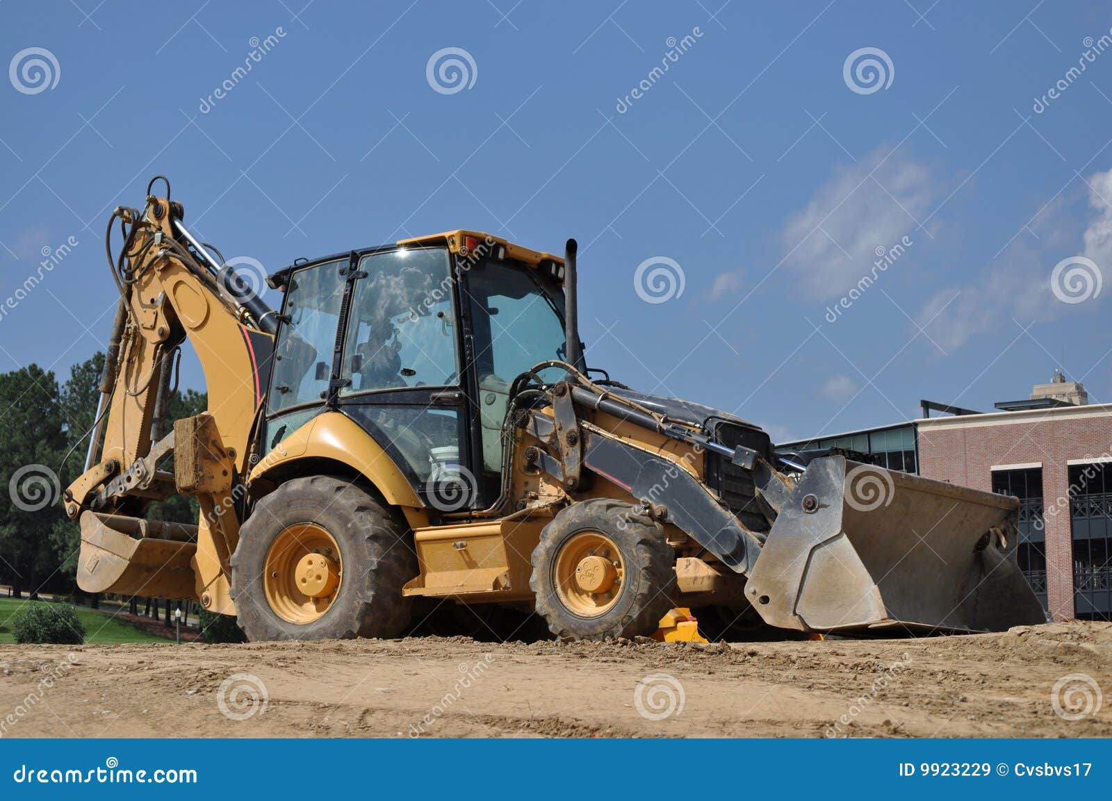 Large Backhoe on a Work Site Stock Image - Image of background ...