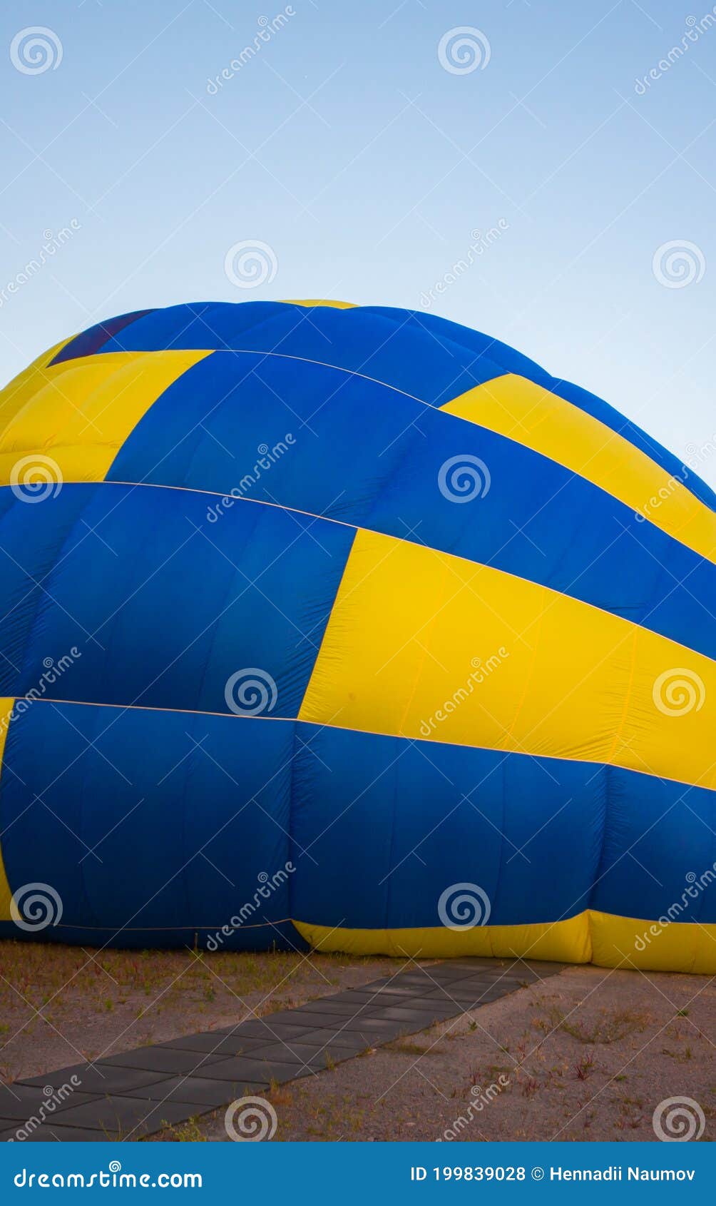 A Large Balloon Lies on the Ground Stock Photo - Image of landscape ...