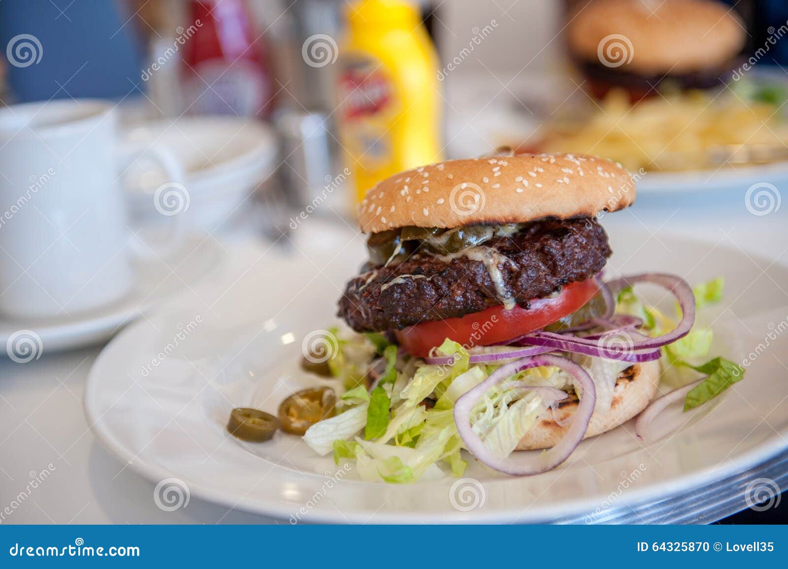 Large beef burger meal stock photo. Image of cheeseburger - 64325870