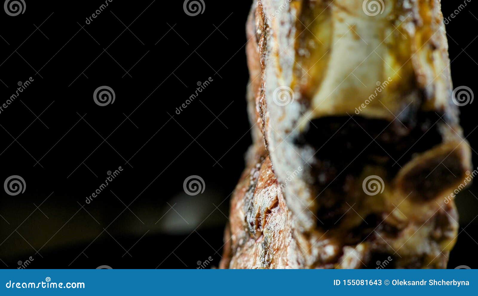 A Large Beef Steak on a Black Background Rotates in a Circle Stock ...