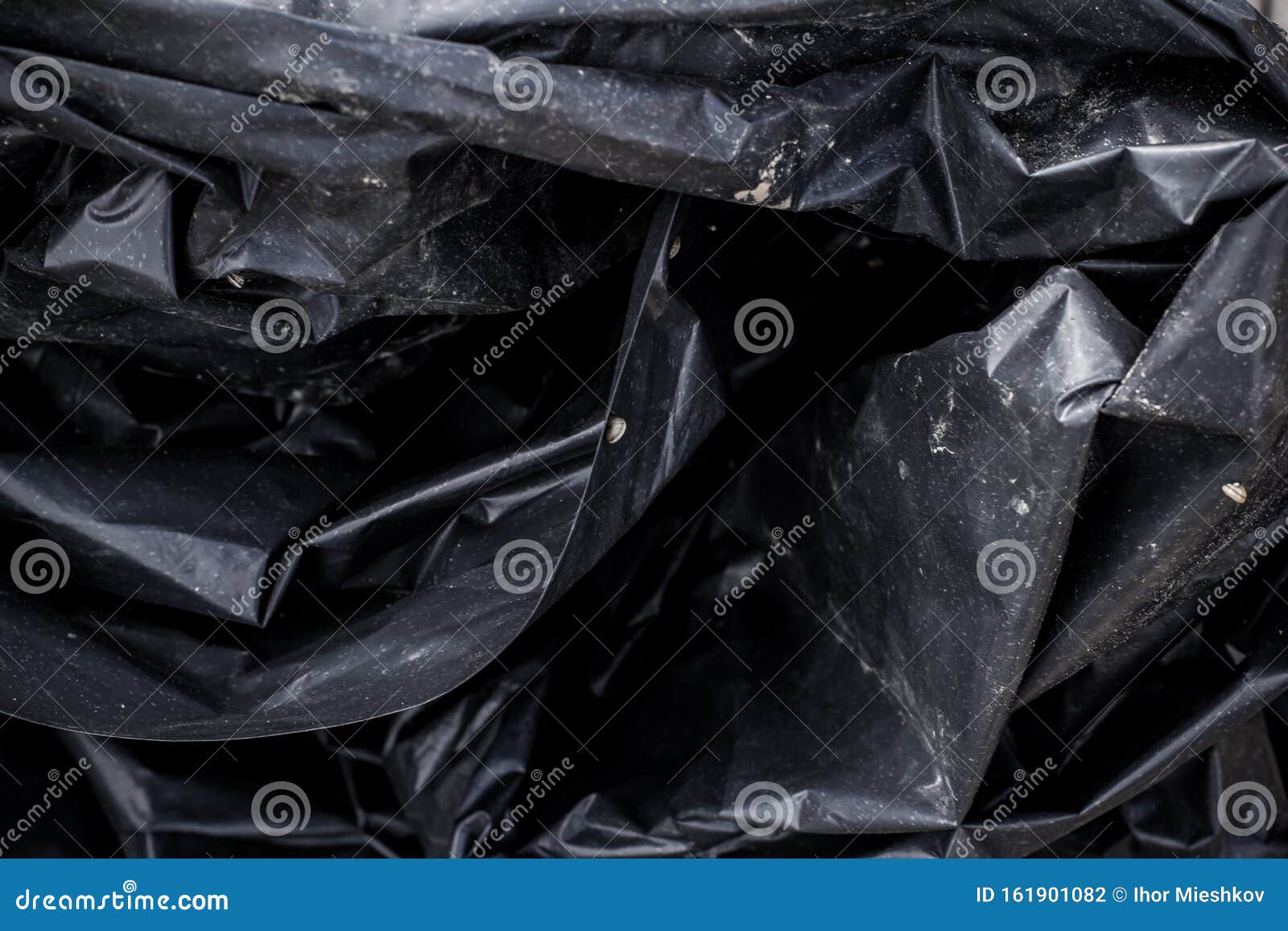 Large Black and Rumpled Plastic Garbage Bag Stock Photo - Image of ...