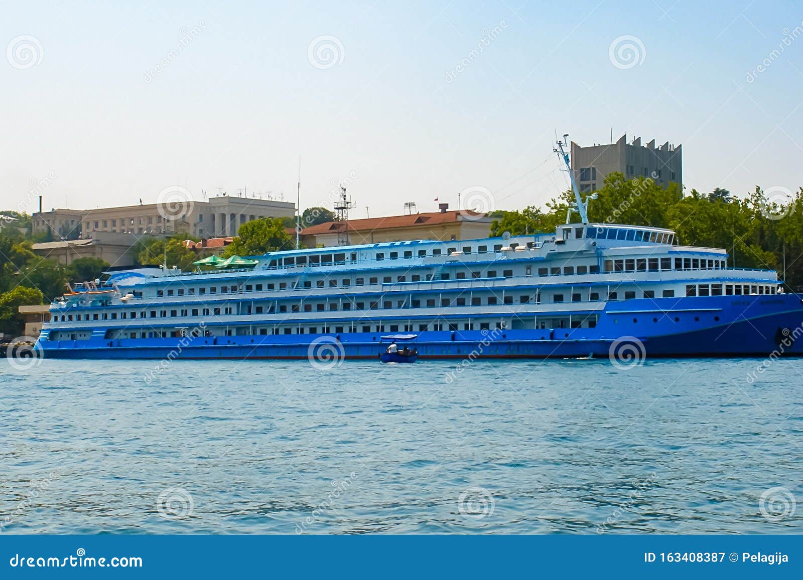 Large Blue Cruise Ship Off the Coast Stock Image - Image of sail ...