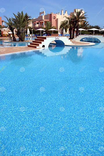 Large, Blue Swimming Pool in Luxurious Spanish Complex Stock Image ...