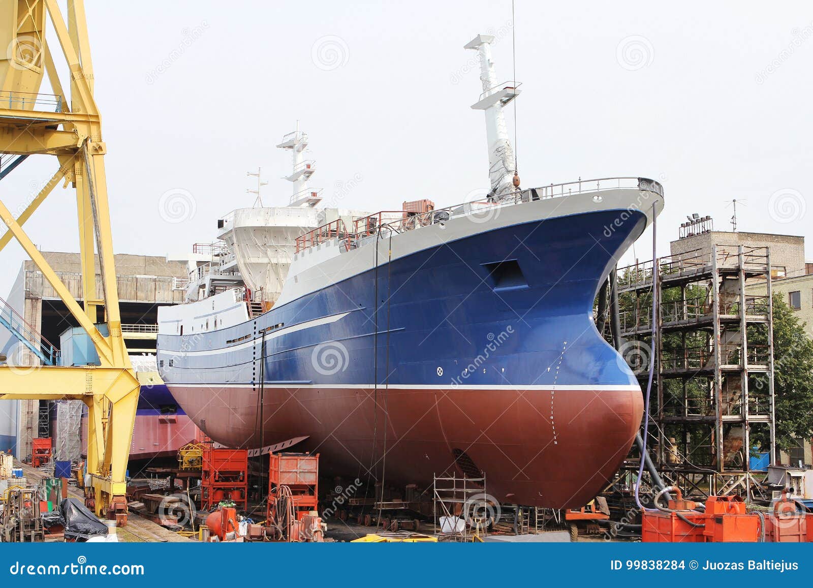 Ship is Being Built at the Shipyard Stock Photo - Image of yellow ...