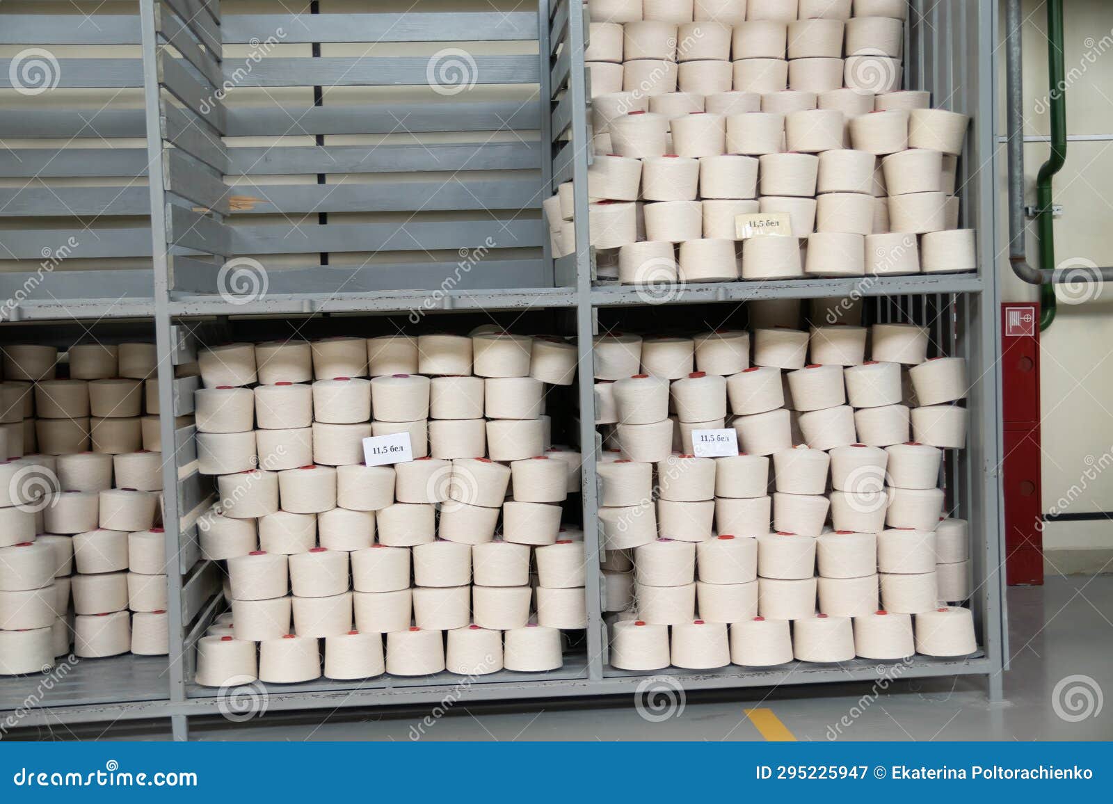 Large Bobbins of Flax Threads on the Rack .Flax Processing Plant ...