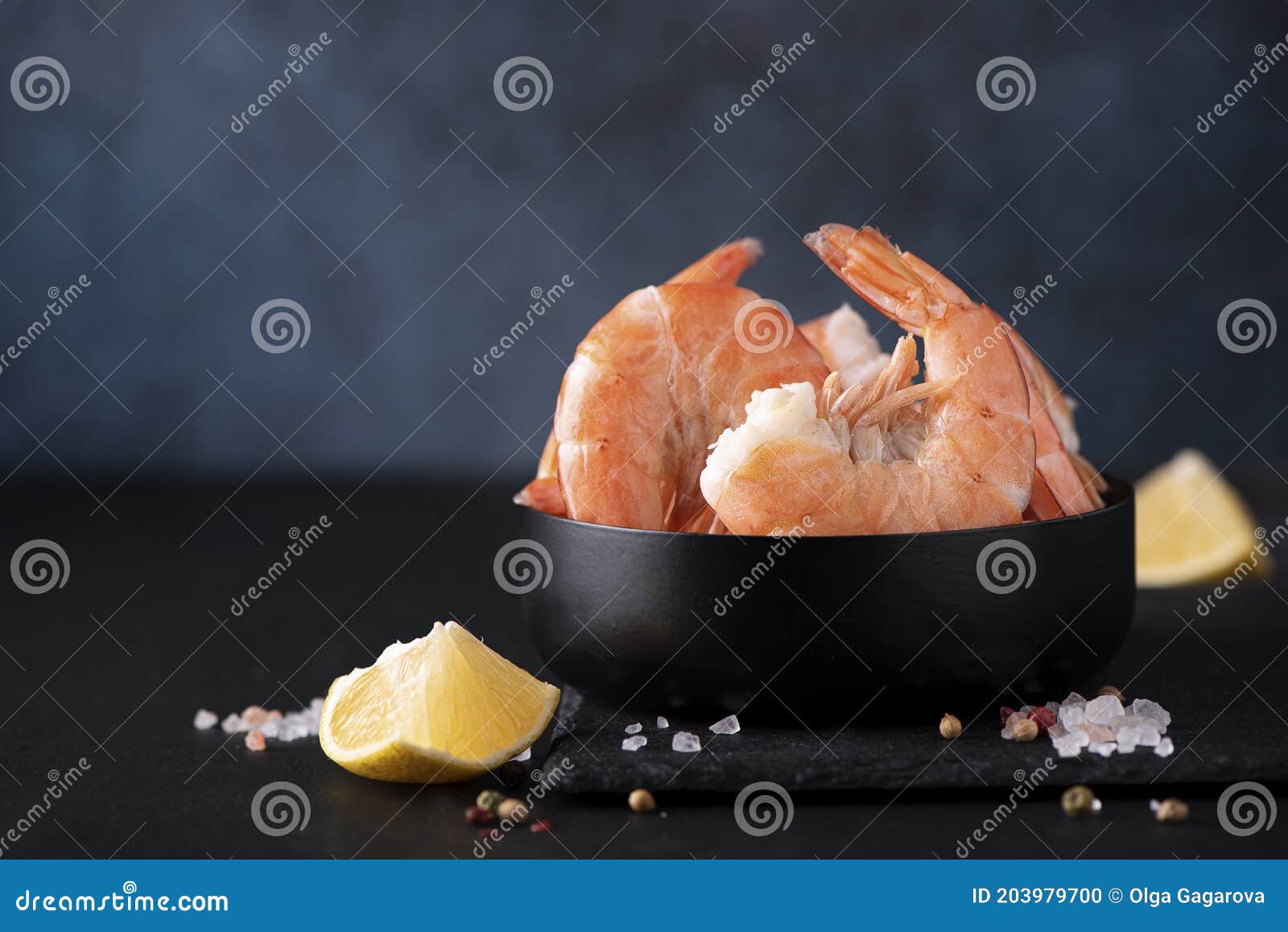 Large Boiled Shrimp in Shell with Lemon in a Black Bowl Stock Photo ...