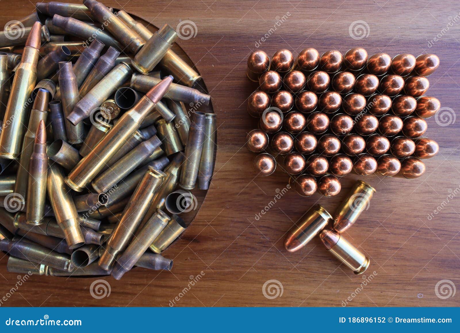 A large bowl of bullets stock photo. Image of cartridges - 186896152