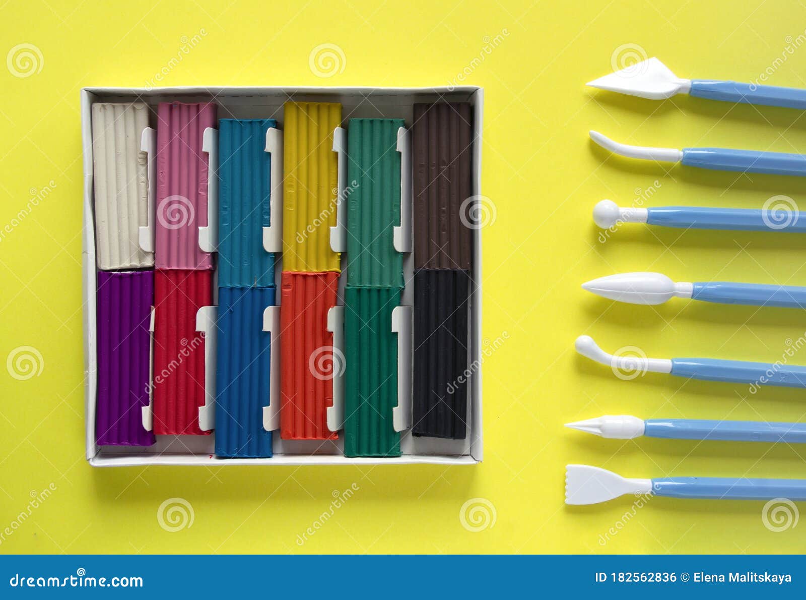 A Large Box with Twelve Pieces of Plasticine of Different Colors and ...