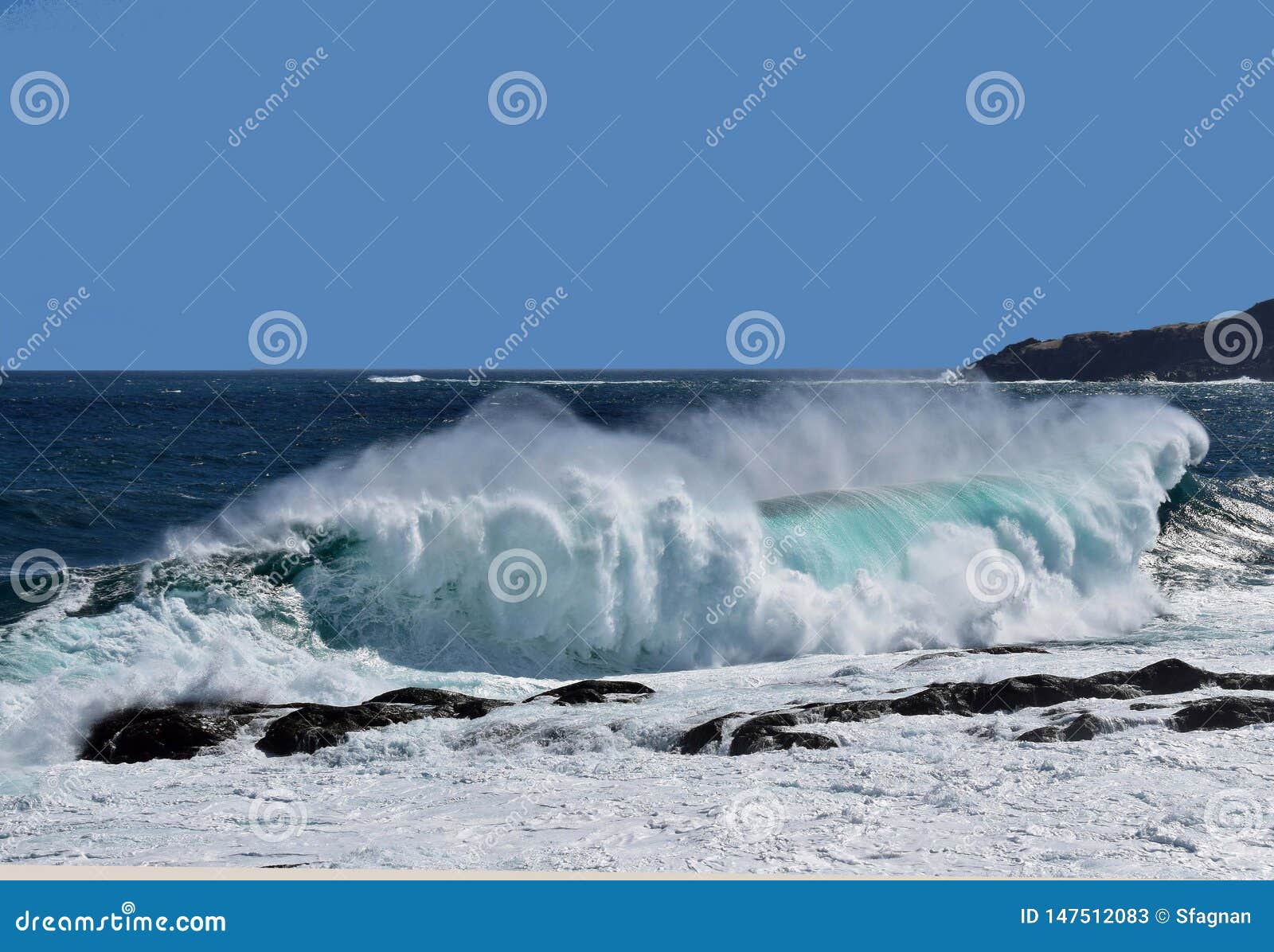 Large Breaking Wave Hitting the Shoreline with a Big Splash Stock Image ...