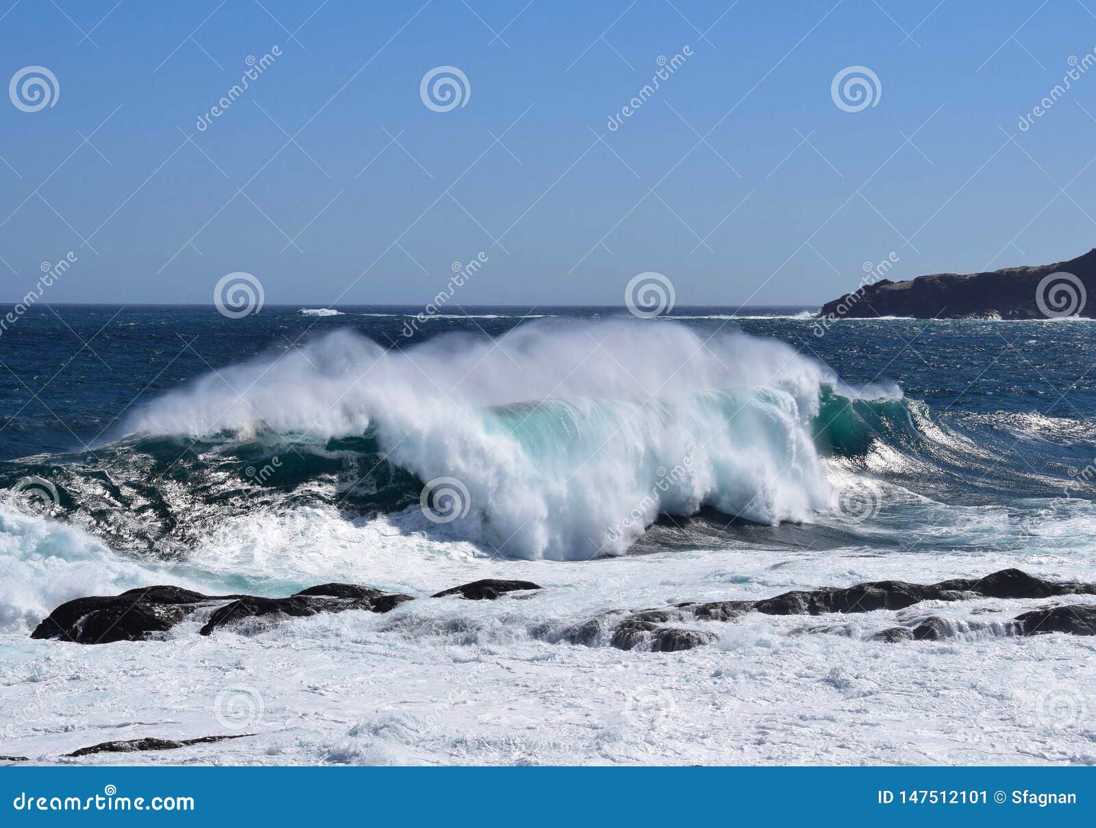 Large Breaking Wave Hitting the Shoreline with a Big Splash Stock Image ...