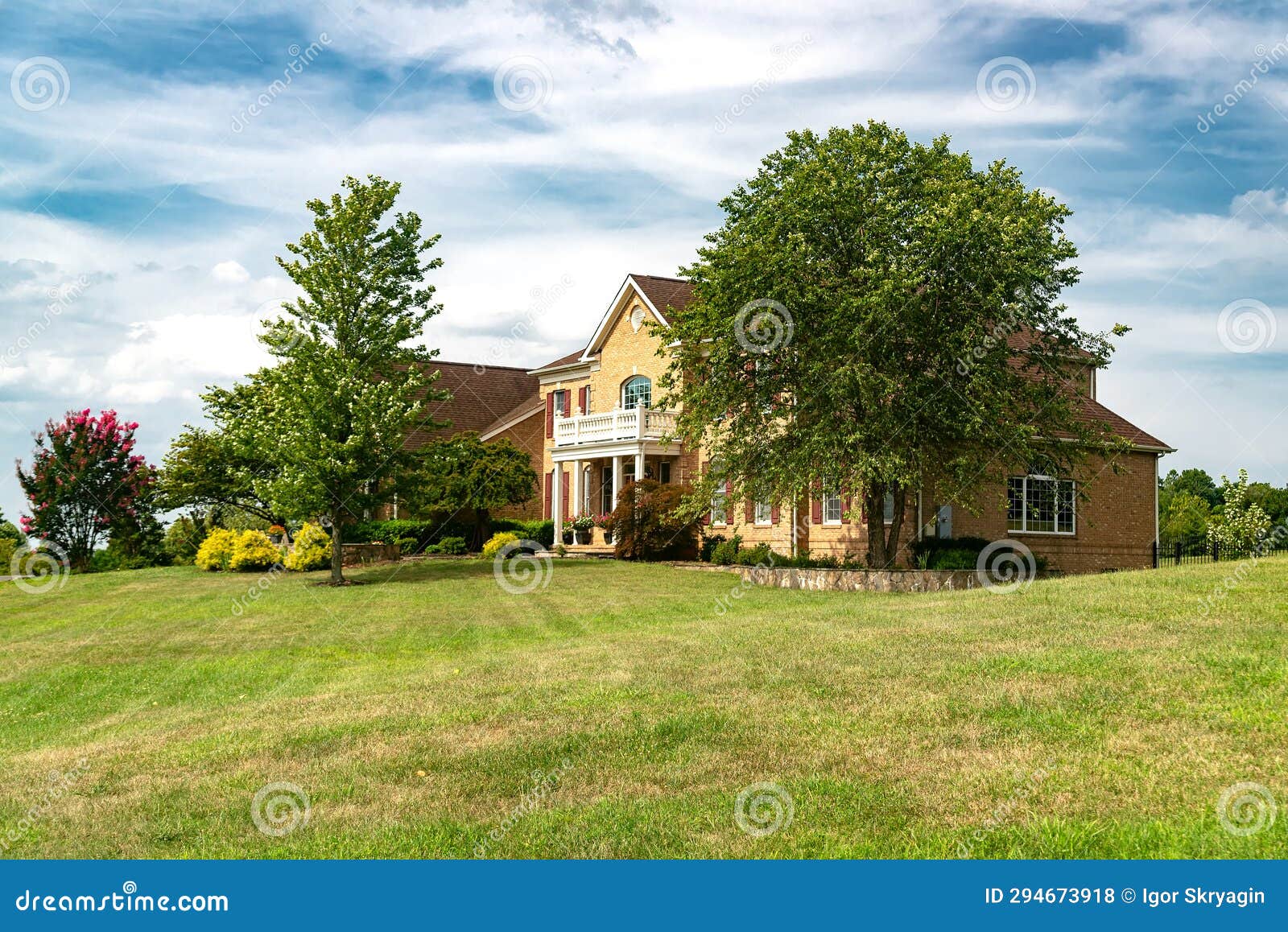 Large Brick Country House with Trees and Expansive Front Lawn Stock ...