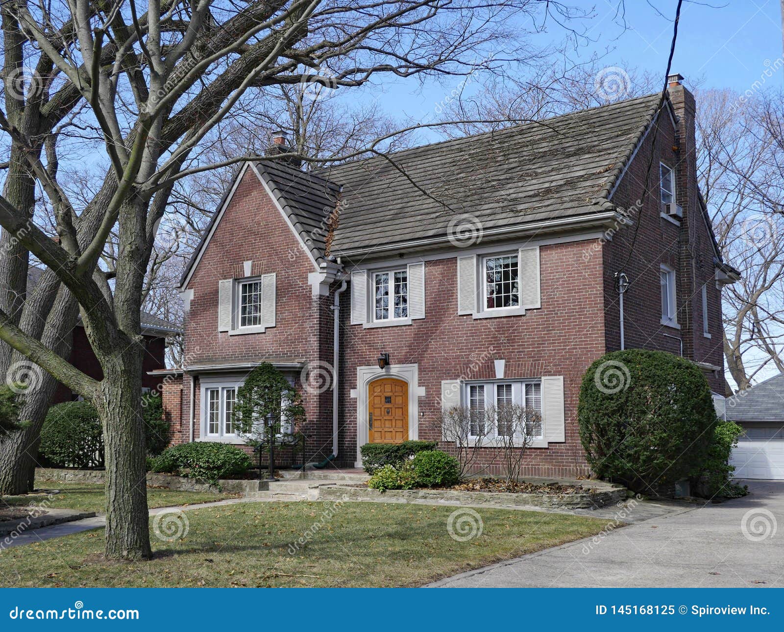 Large brick detached house stock image. Image of suburb - 145168125