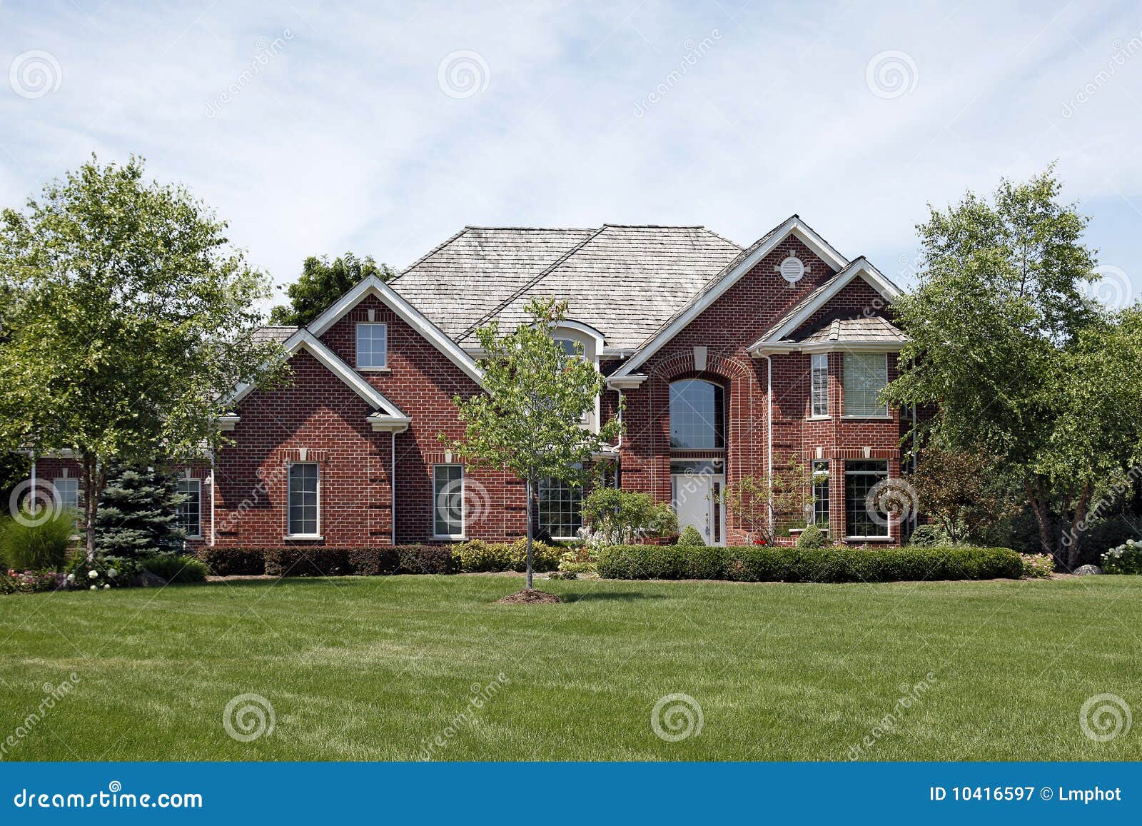 Large Brick Home in Suburbs Stock Image - Image of landscape, luxury ...