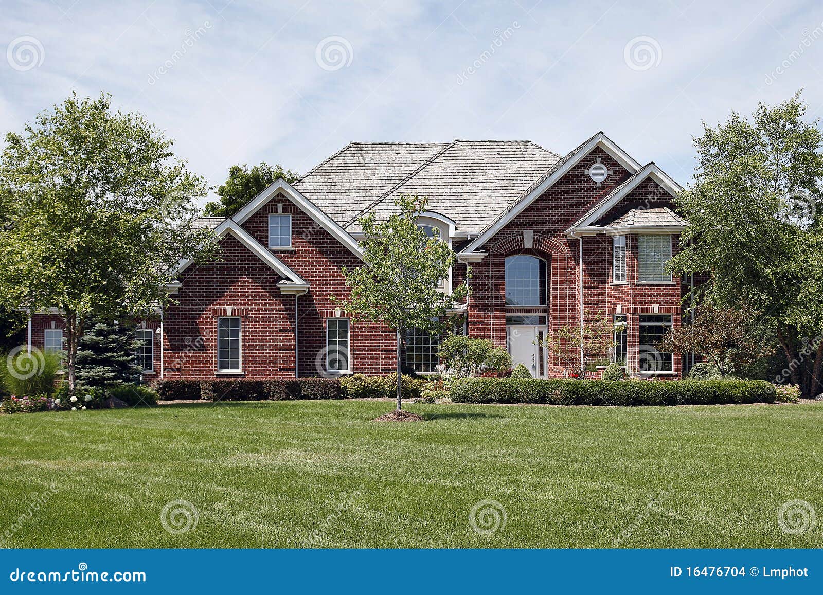 A Large Brick Apartment Building With Lots Of Fire Escapes. Royalty ...