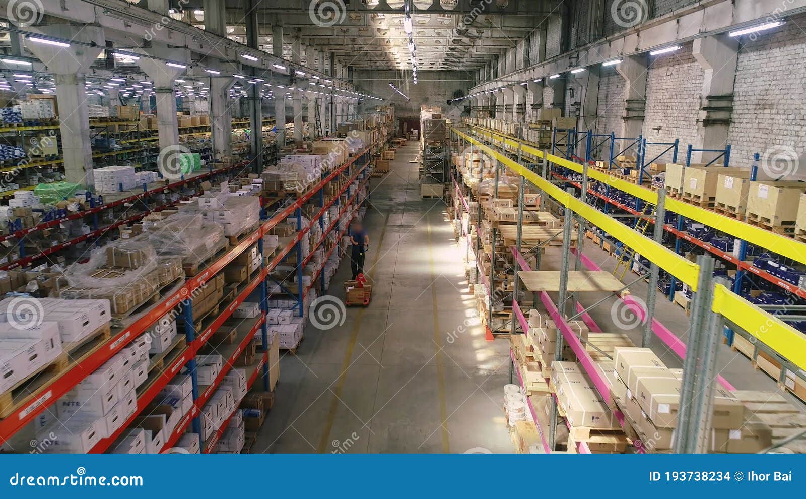 Large Bright Warehouse with Long Rows. Long Rows of Warehouse with ...