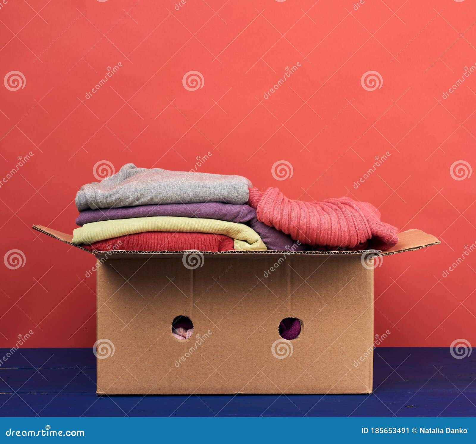 Large Brown Cardboard Box Filled with Clothes Stock Image - Image of ...