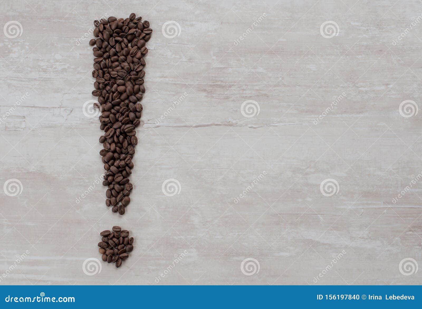 A Large Brown Exclamation Mark of Natural Coffee Beans is on the Table ...