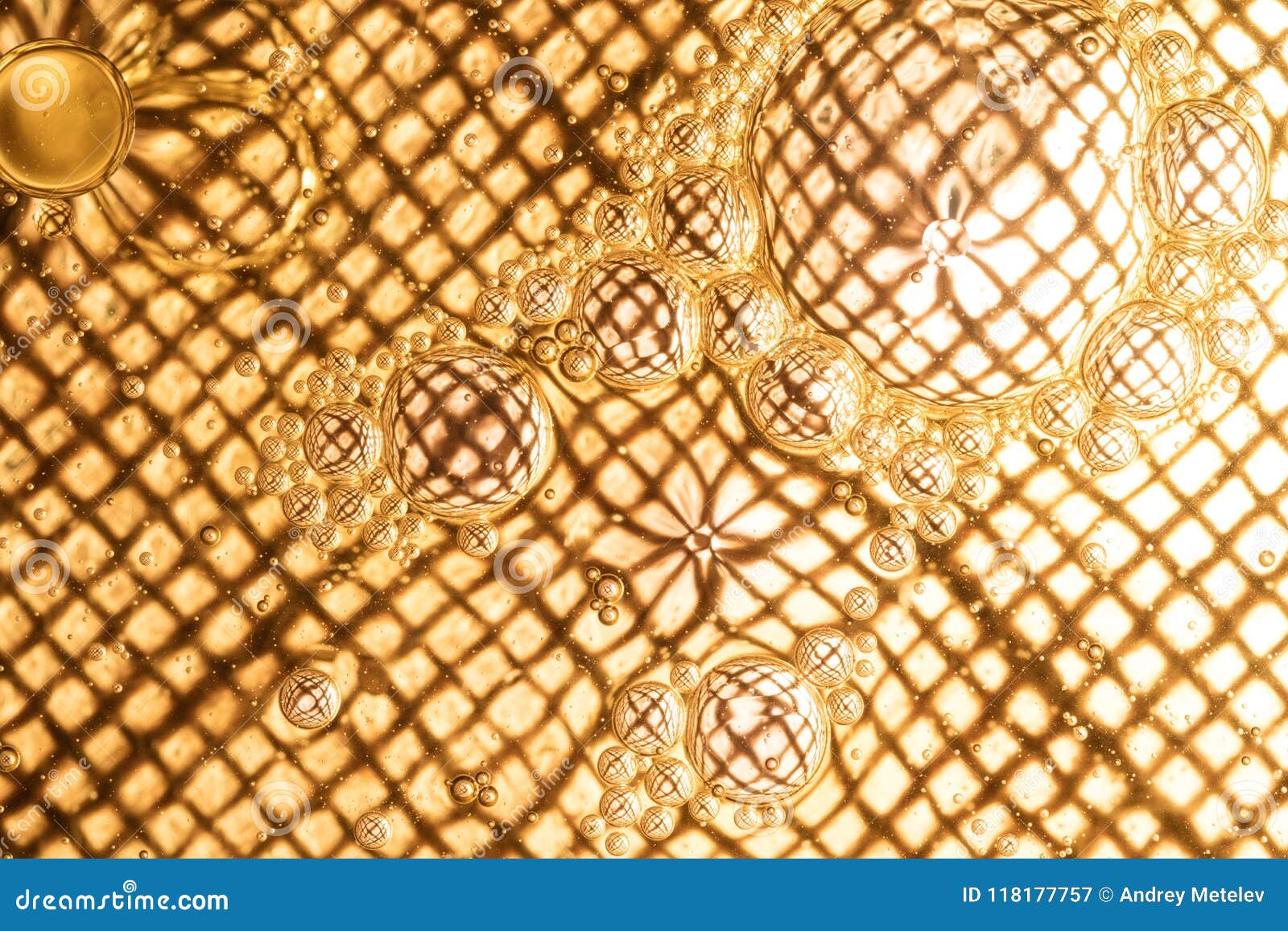 Large Bubbles on the Background of a Mesh of Cloth Placed Under the ...