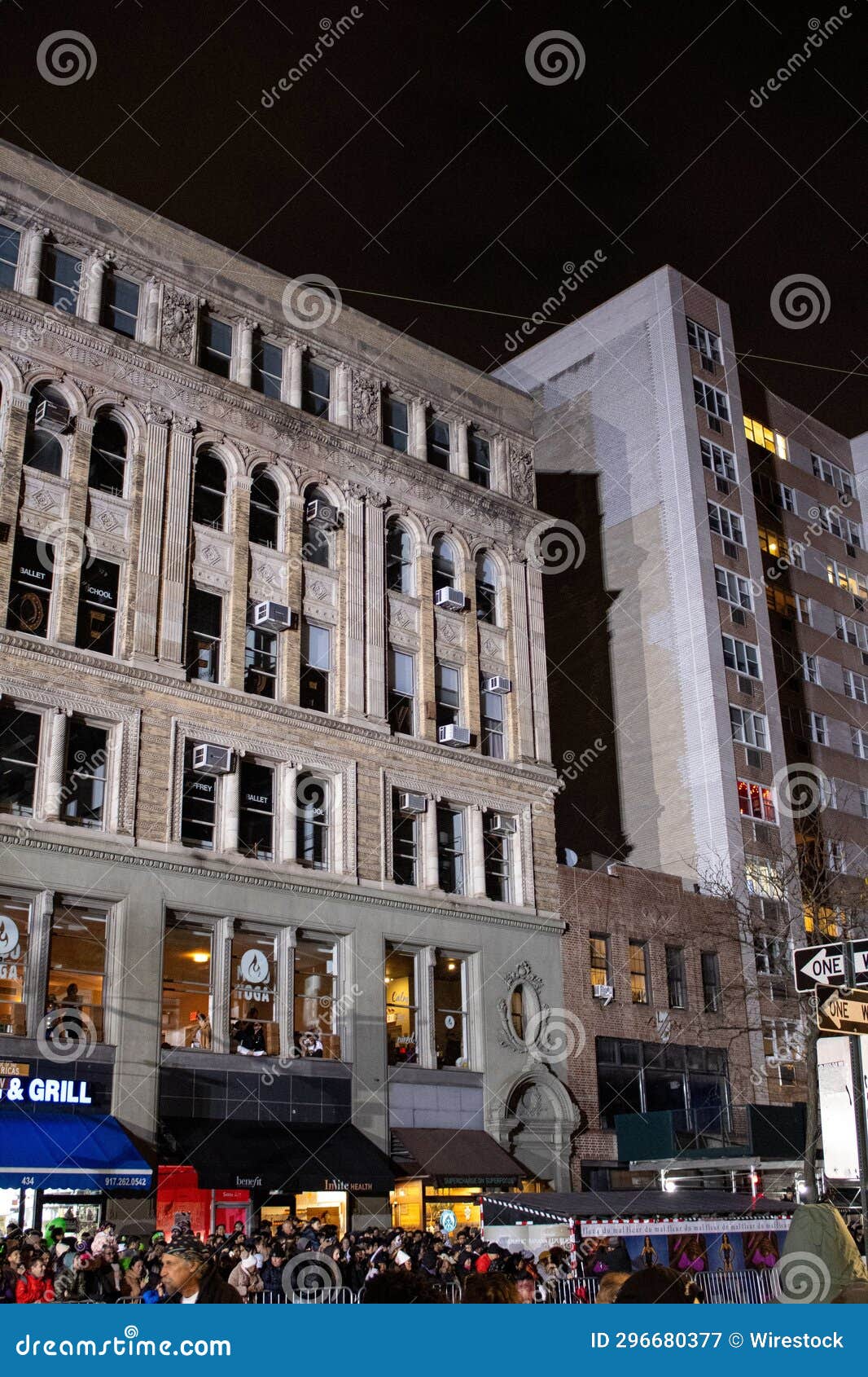 A Large Building with a Clock on the Front of it Editorial Photography ...