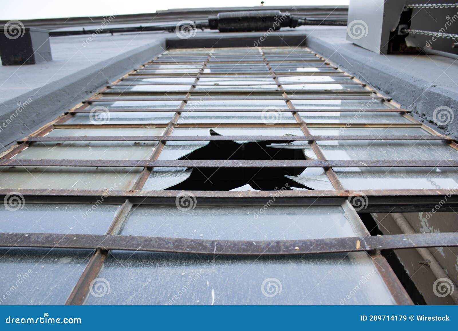 Large Building with a Cracked Glass Window Stock Image - Image of frame ...