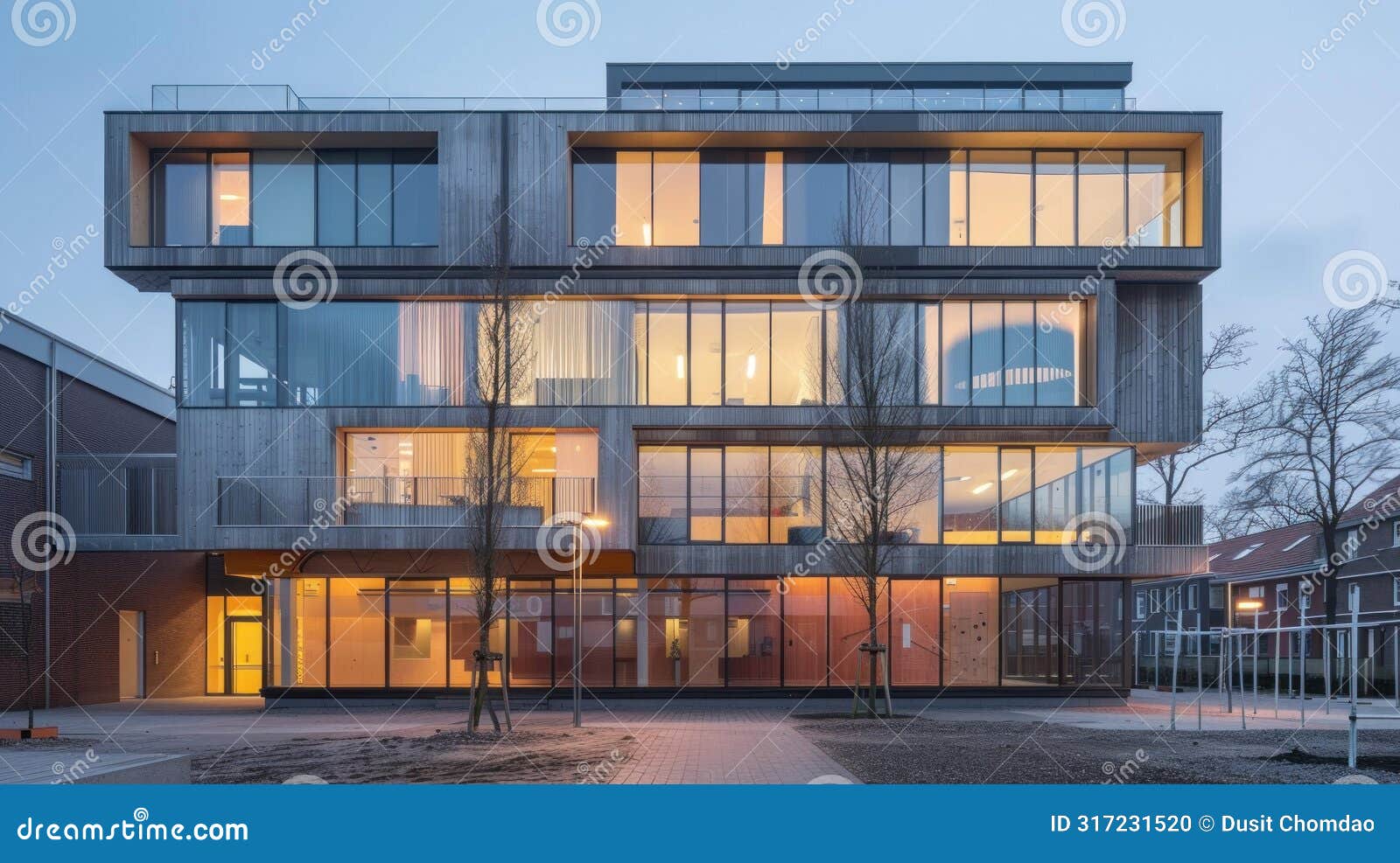 A Large Building with a Lot of Windows and a Slanted Roof Stock Photo ...