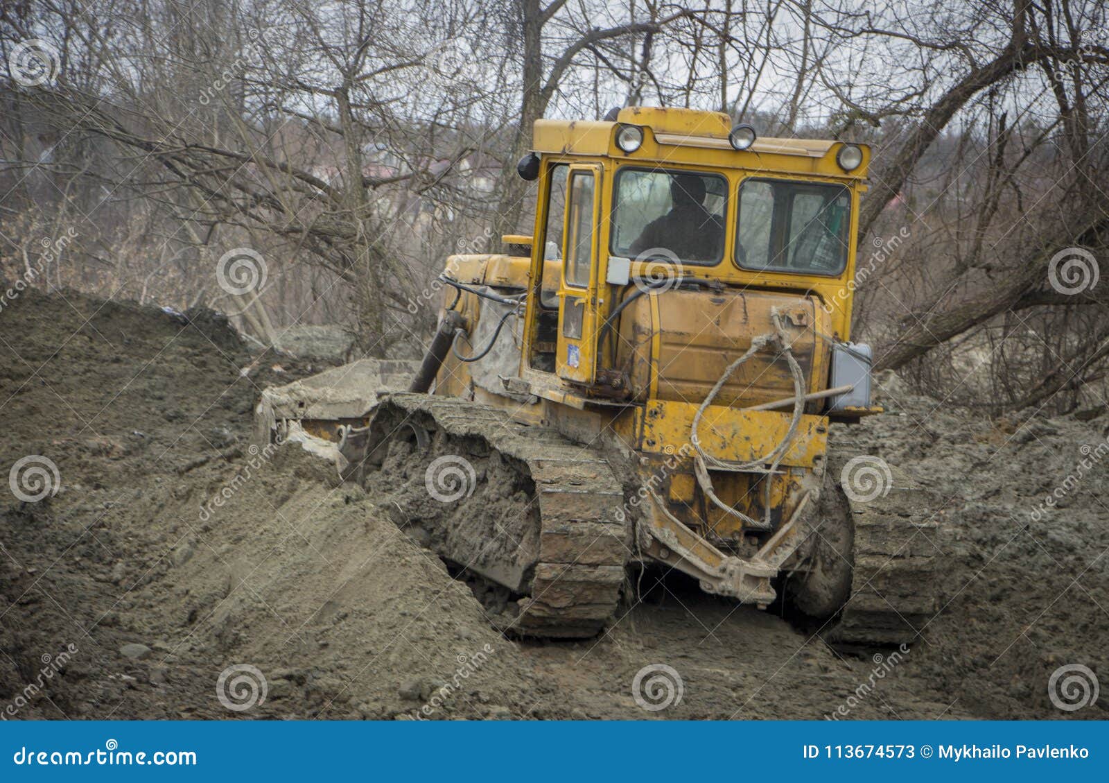 A Large Bulldozer Digs a Reclamation Channel Stock Image - Image of ...