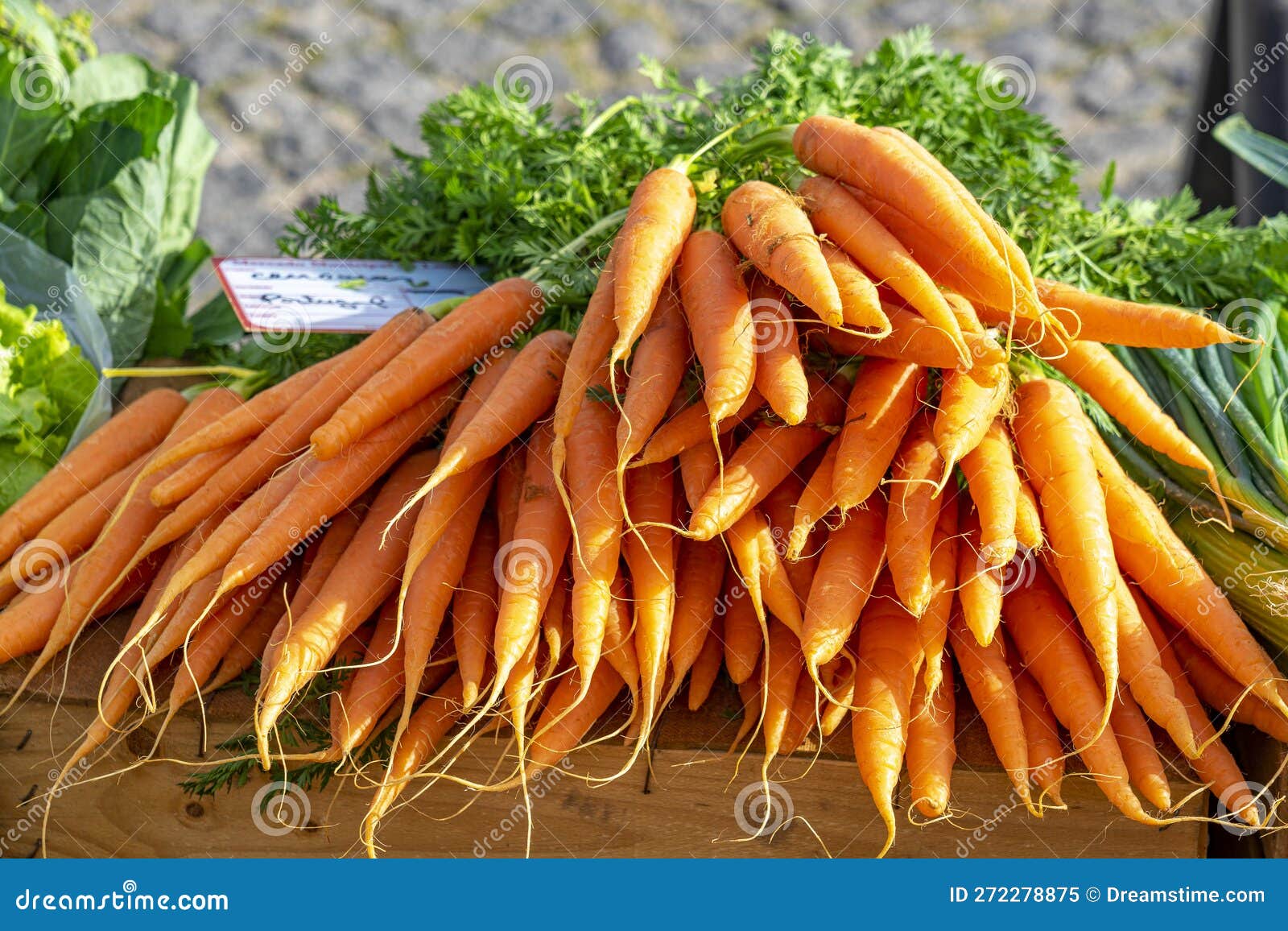 Large Bunch of Carrots Stacked in Parallel on a Market Stall. Stock ...