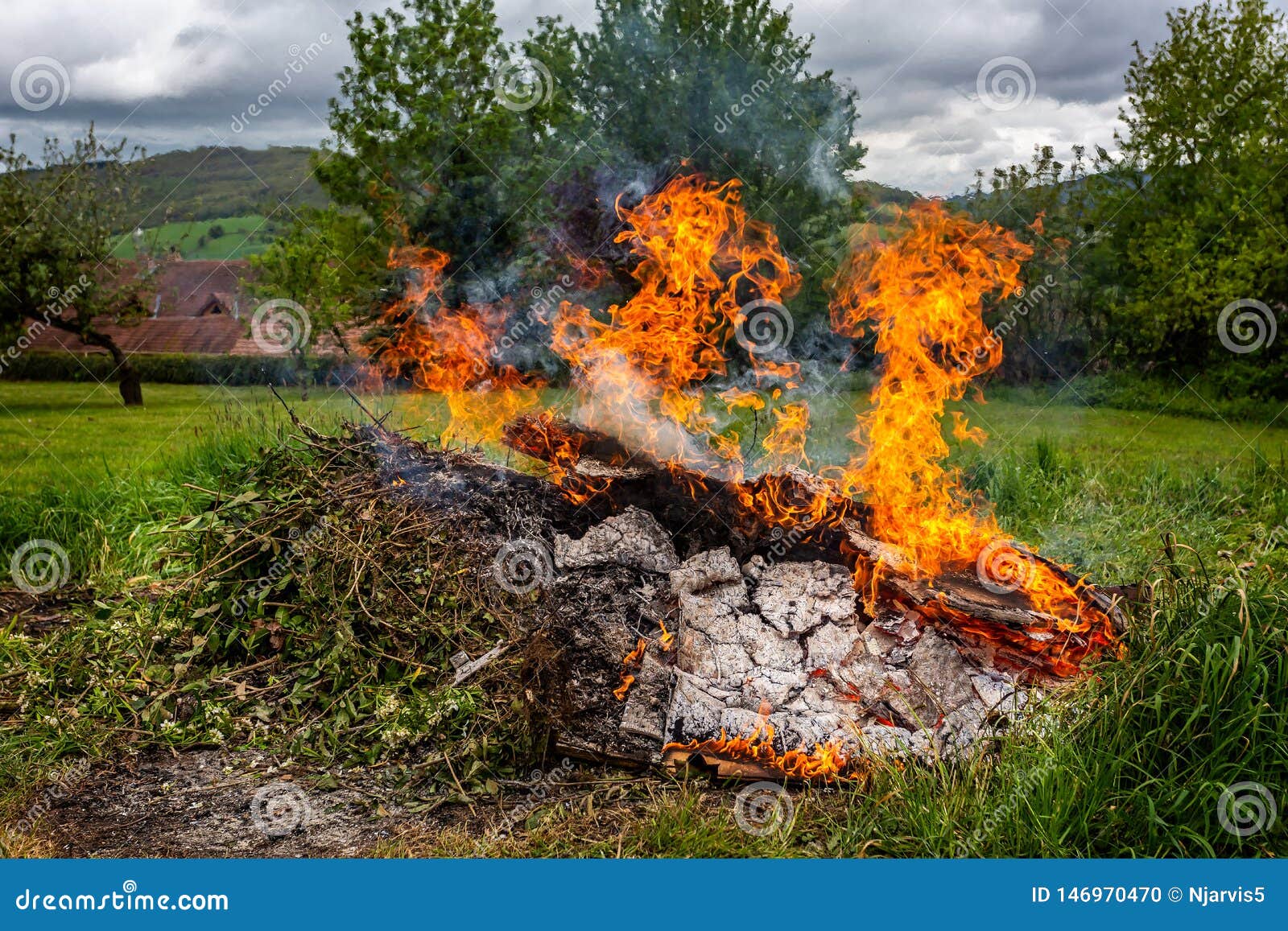 Large Burning Bonfire in Field Stock Photo - Image of white, grass ...