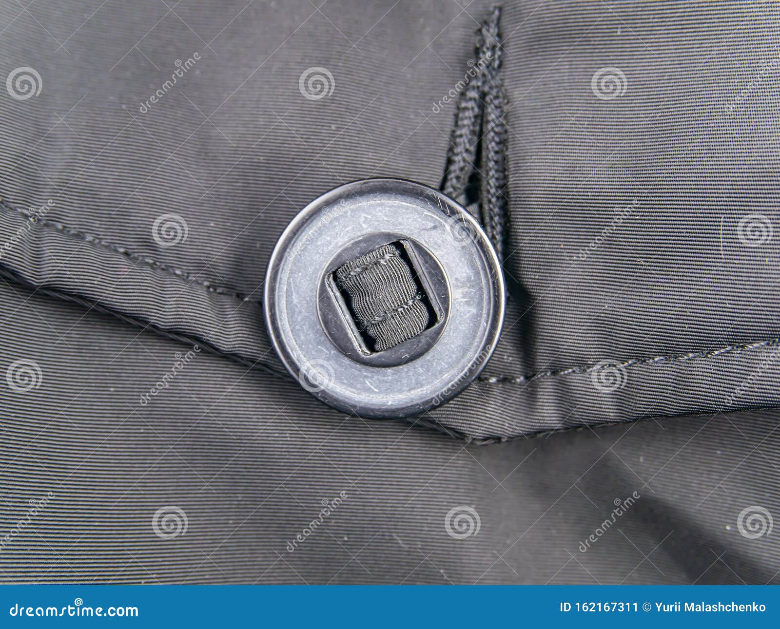 A large button on clothes stock image. Image of decorative - 162167311