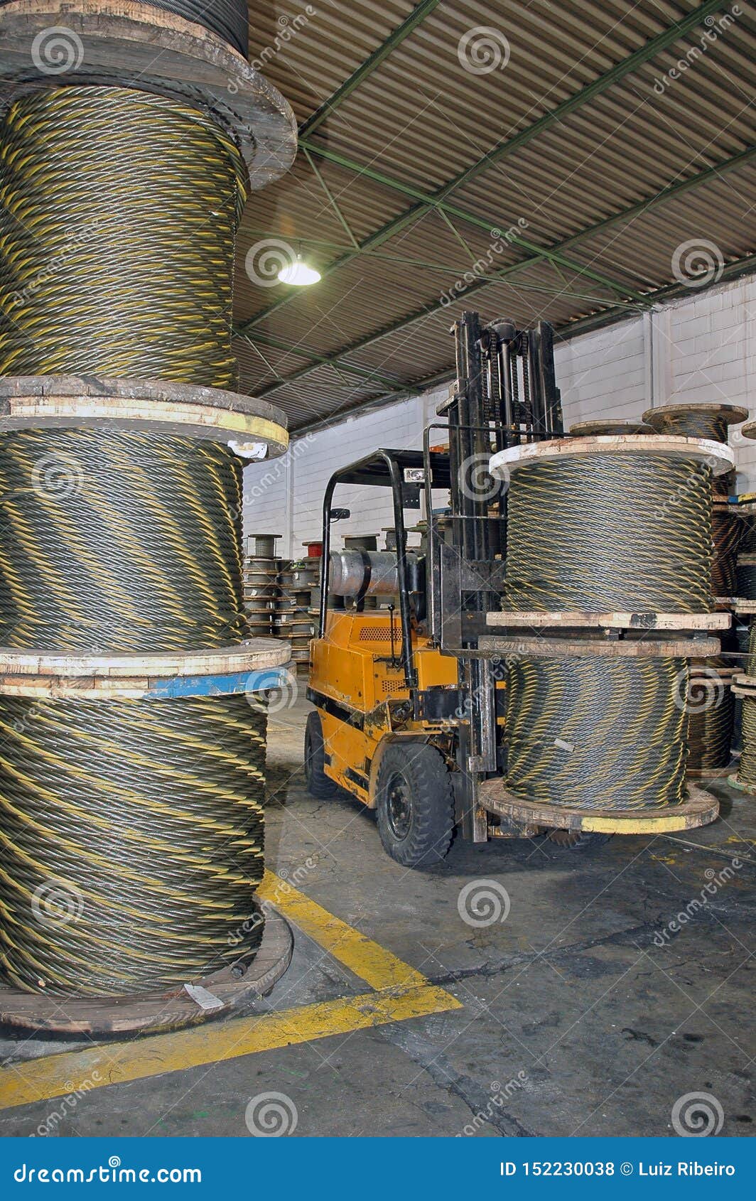 Large cable reels stocked stock photo. Image of detail - 152230038