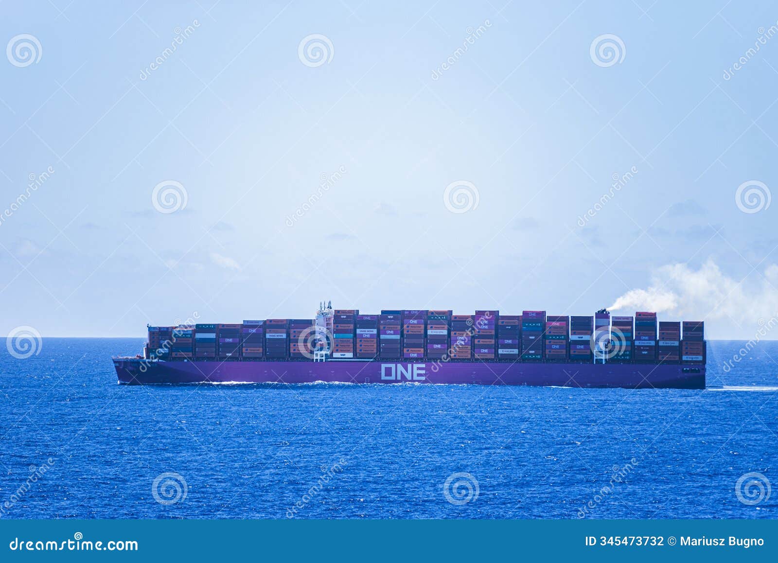 Large Cargo Ship Navigating The Bosphorus With Istanbul City Skyline In ...