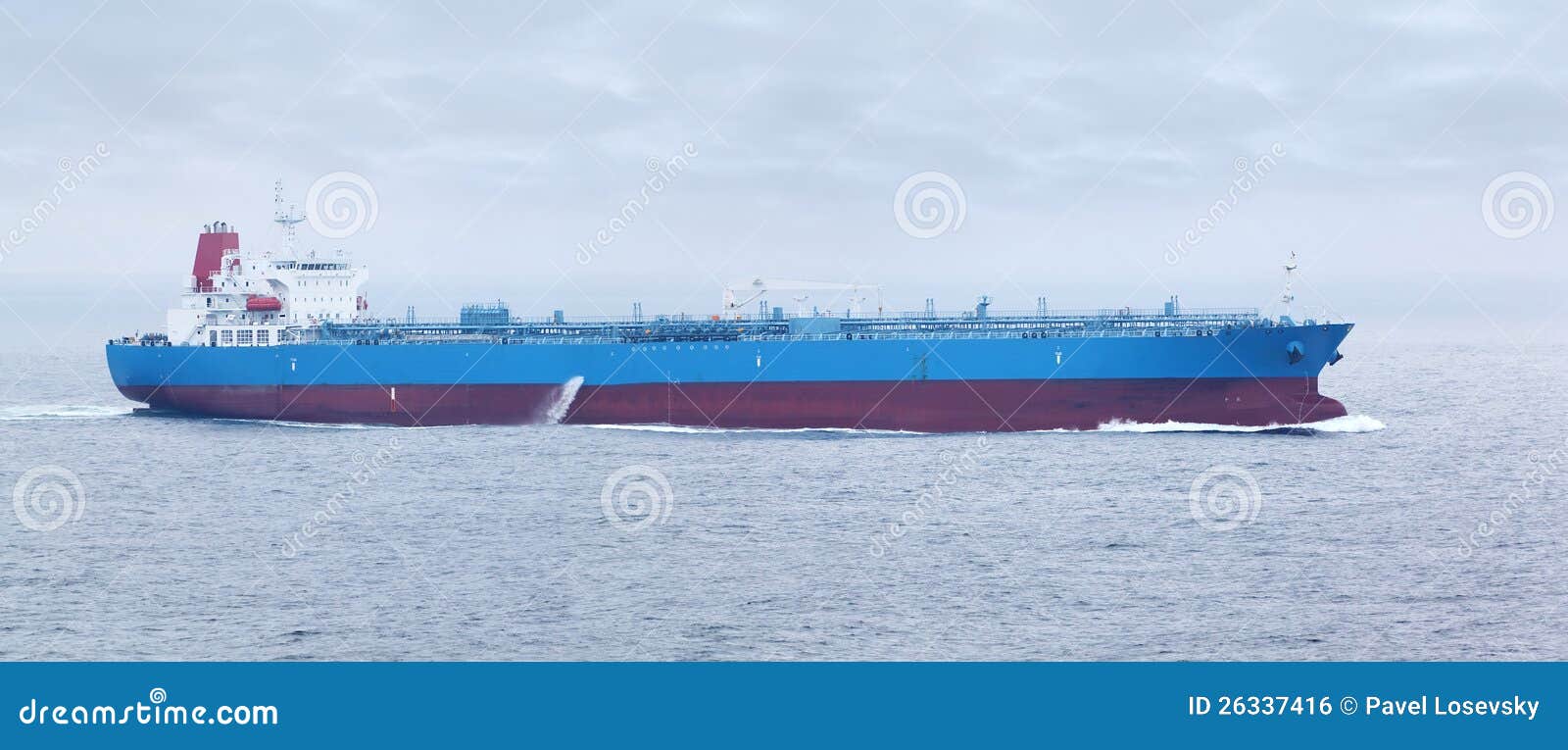 Large Cargo Ship Floats in Open Ocean Stock Photo - Image of ocean ...