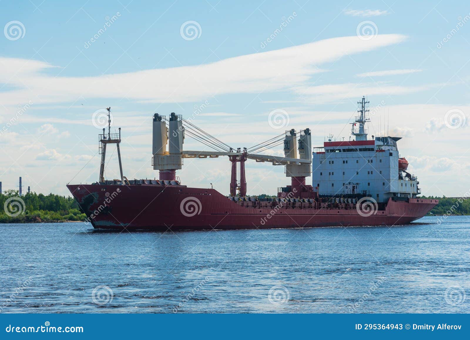A Large Cargo Ship on the Roadstead on the River. Background Blue Sky ...