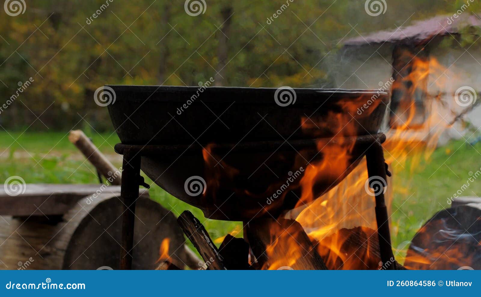 Cooking Outside on a Bonfire in a Large Cast-iron Cauldron. Stock ...