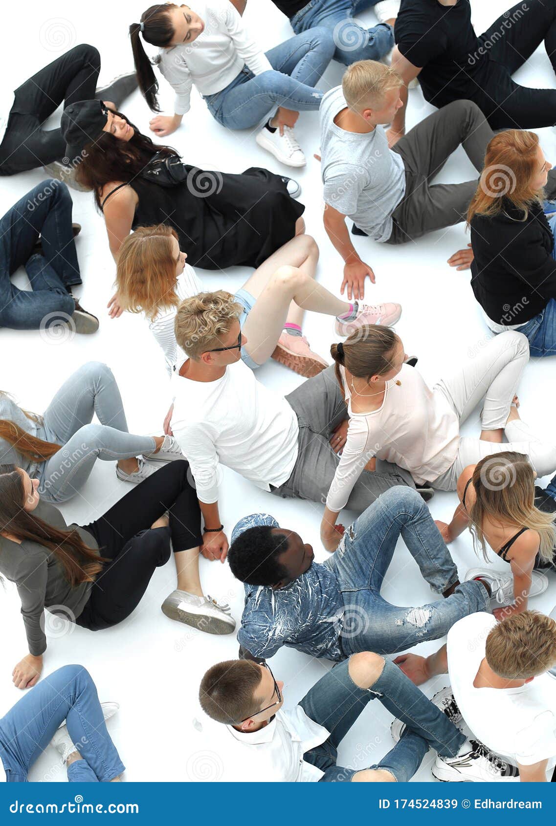 Large Casual Group of Young People Sitting on the Floor. Stock Image ...
